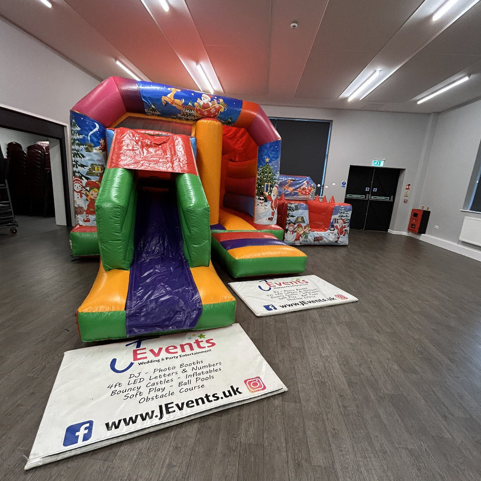 Christmas Multicoloured Bounce 'n' Slide Inflatable with Red Ball Pool ...